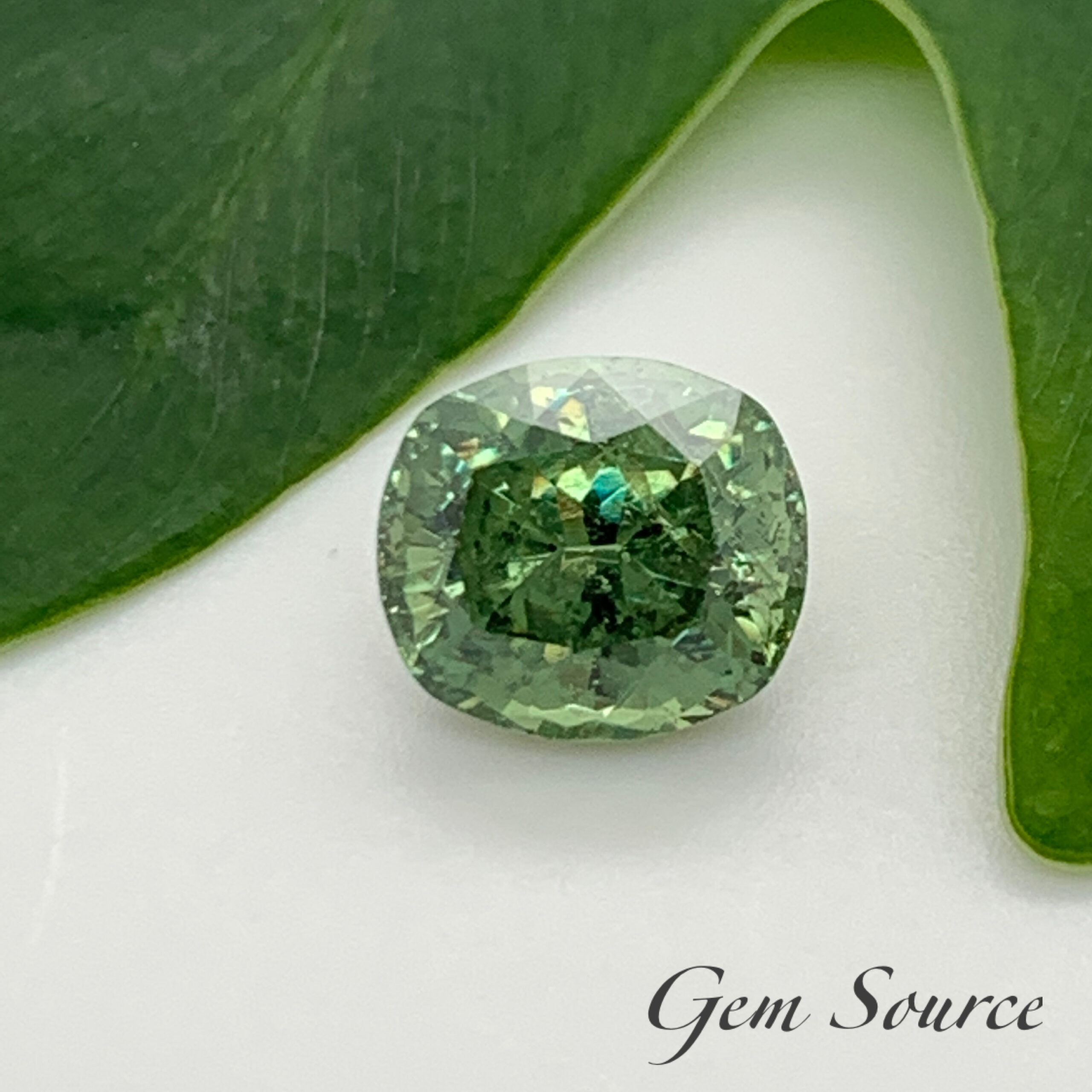 Garnet Demantoid Cushion-cut 2.61ct. - Gem Source